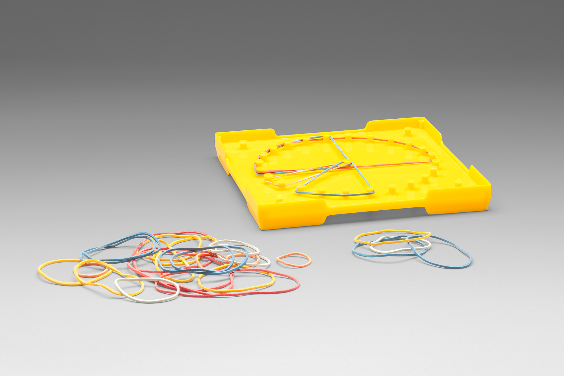 Geoboard small double sided yellow